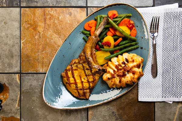 Honey Mustard Garlic Tomahawk Pork Chop Recipe - Martin Bros. Distributing